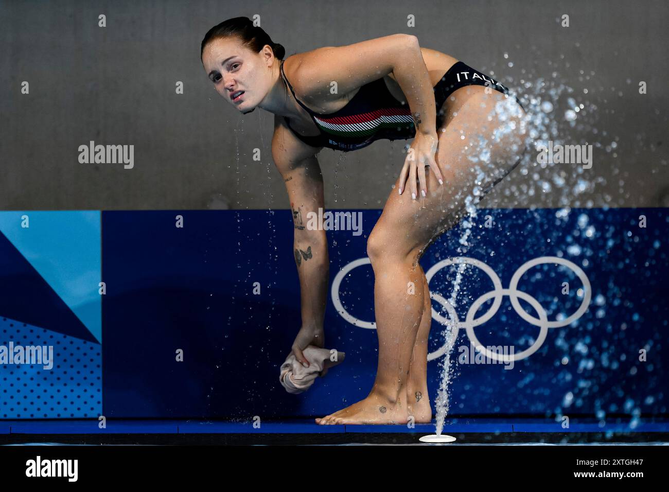 Chiara Pellacani of Italy reacts after competing in the diving 3m ...