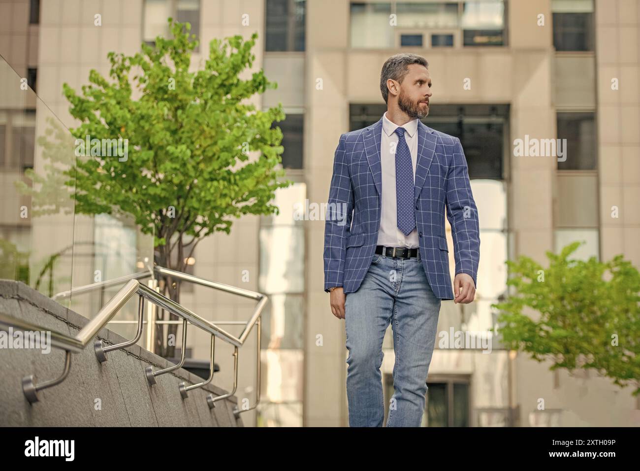 business manager walk on urban background. business manager wearing ...
