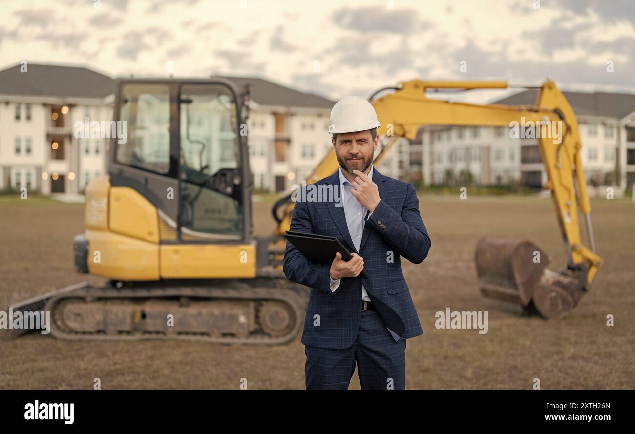 smiling construction inspector engineer architecting outdoor. photo of ...
