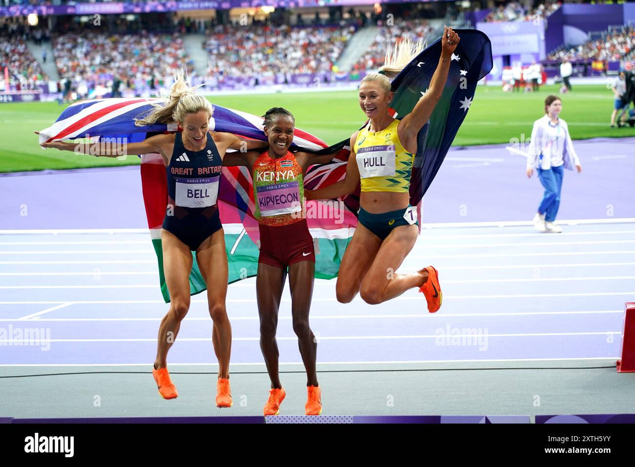 Womens 1500m Final Kenyas Faith Kipyegon celebrates winning gold with ...