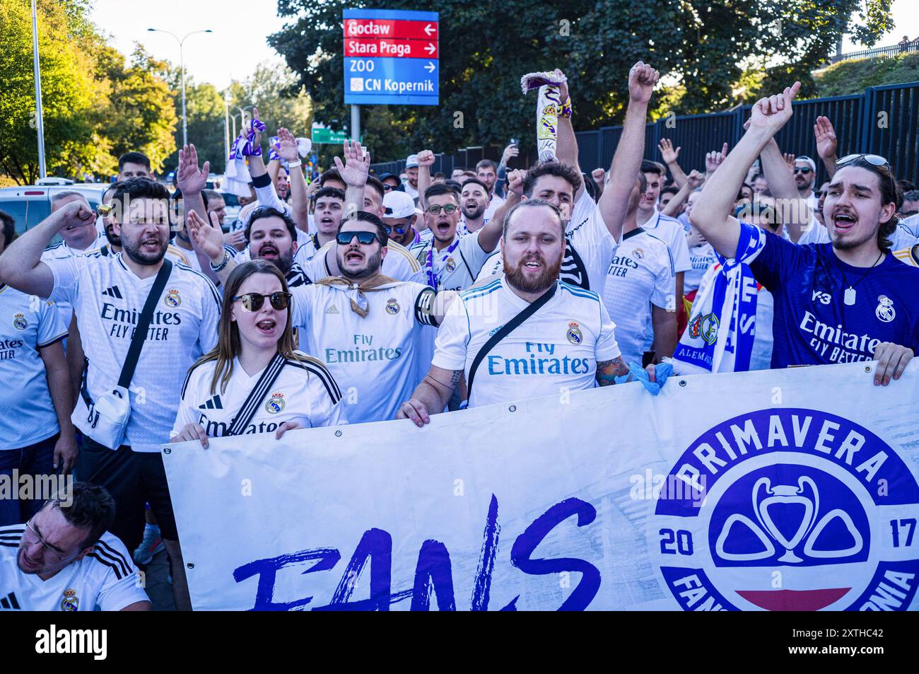 Polish Real Madrid fans chant in support of their team. Fans of Spanish ...