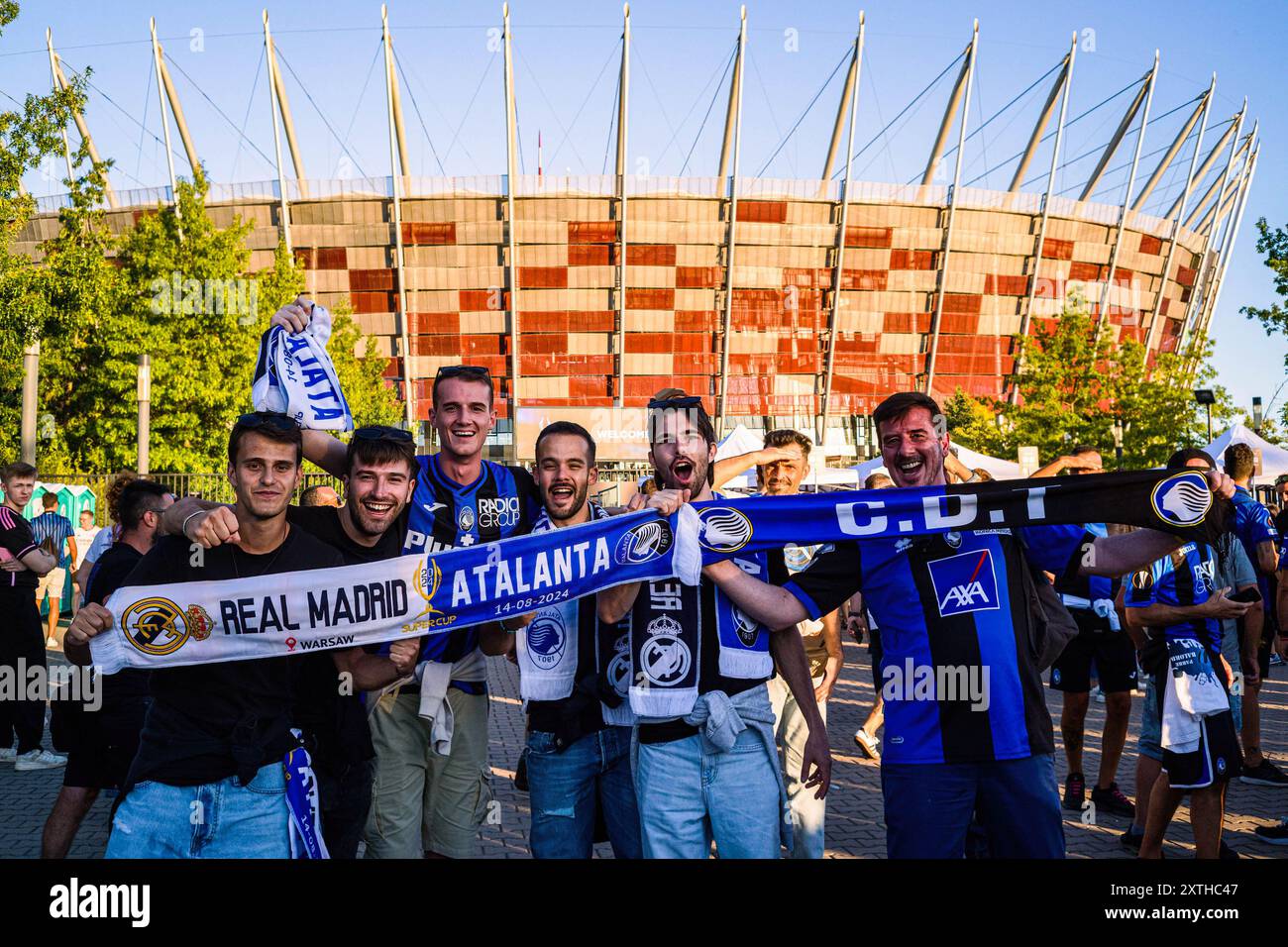 Atalanta fans pose for a picture outside the stadium. Fans of Spanish ...