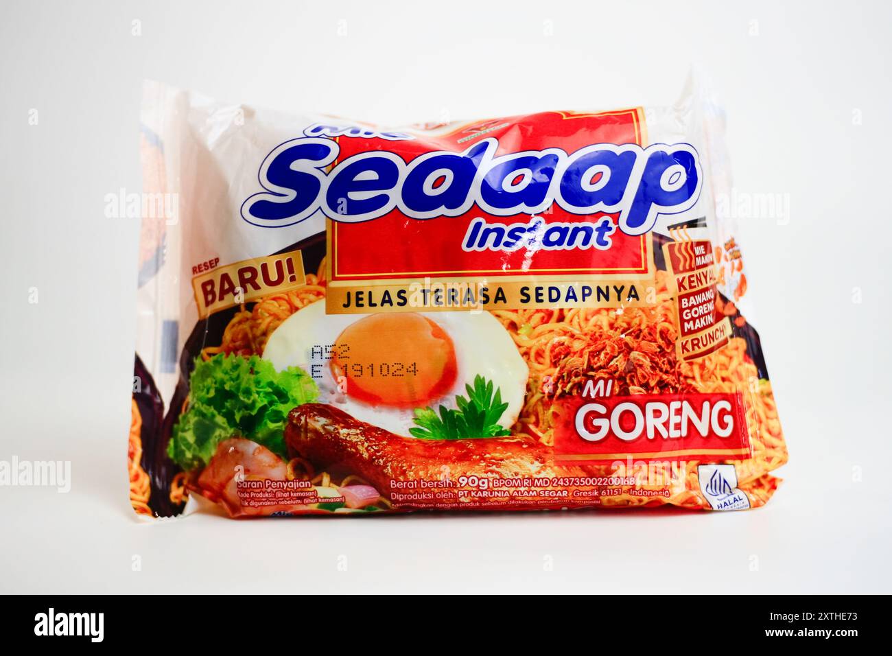 Close up a pack of Mie Sedaap Goreng Instant Noodle isolated on white ...