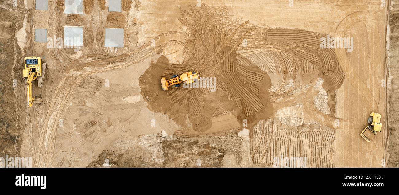 earthworks on building site by heavy construction machines to get the ...