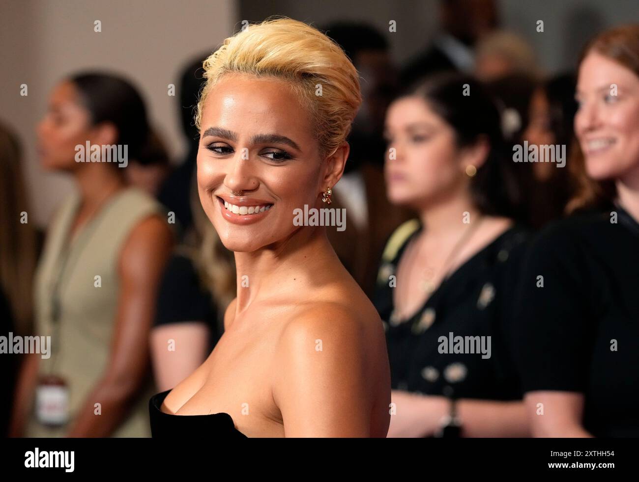 Nathalie Emmanuel, a cast member in "The Killer," poses at the premiere ...