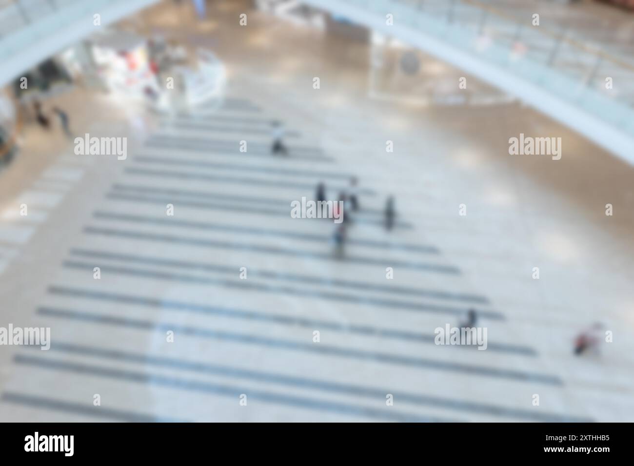 A blurred overhead view of people walking in a shopping mall in Shenzhen, China Stock Photo - Alamy