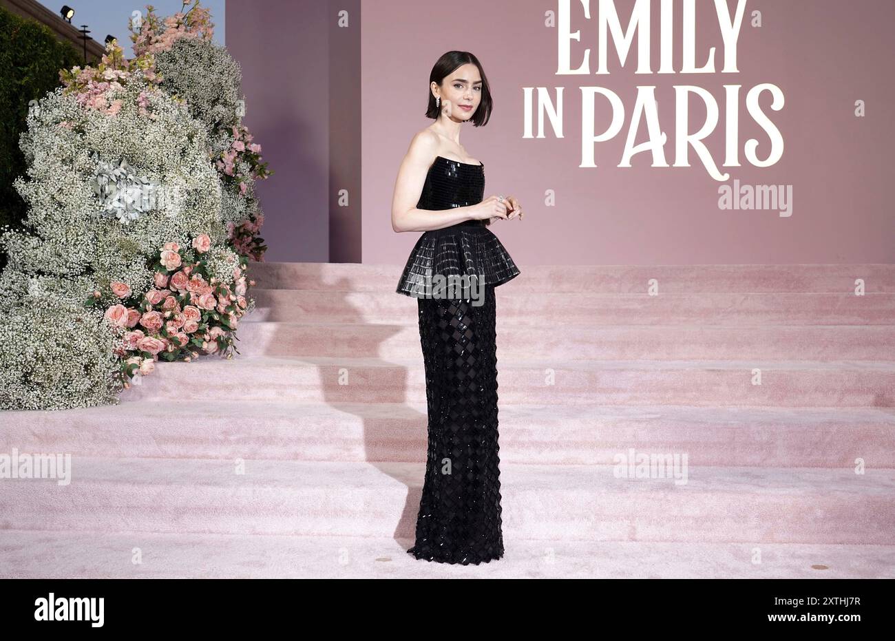 Lily Collins arrives at the premiere of "Emily in Paris" at the ...
