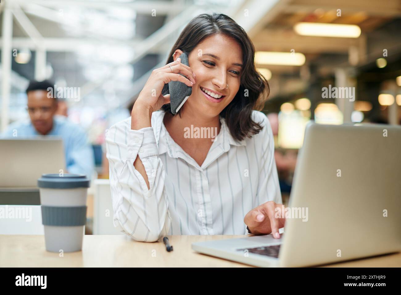 Office, laptop and businesswoman in phone call with contact, networking ...