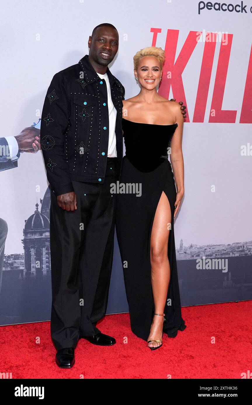 Omar Sy, left, and Nathalie Emmanuel pose together at the premiere of ...