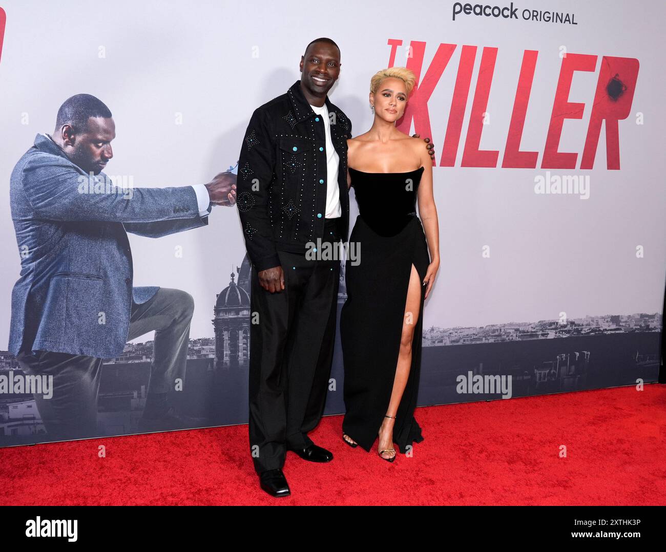 Omar Sy, left, and Nathalie Emmanuel pose together at the premiere of ...