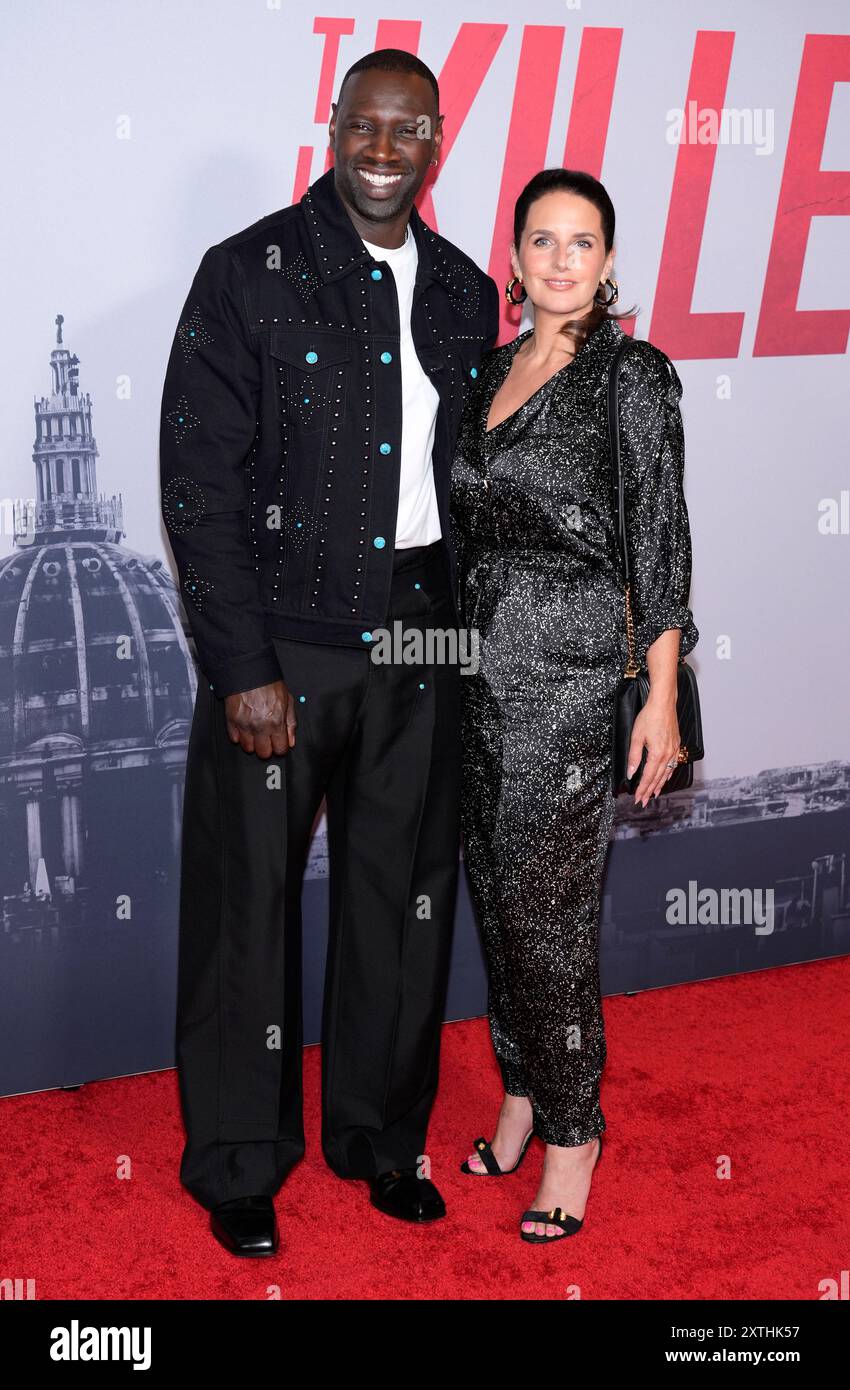 Omar Sy poses with his wife Helene at the premiere of the Peacock film ...