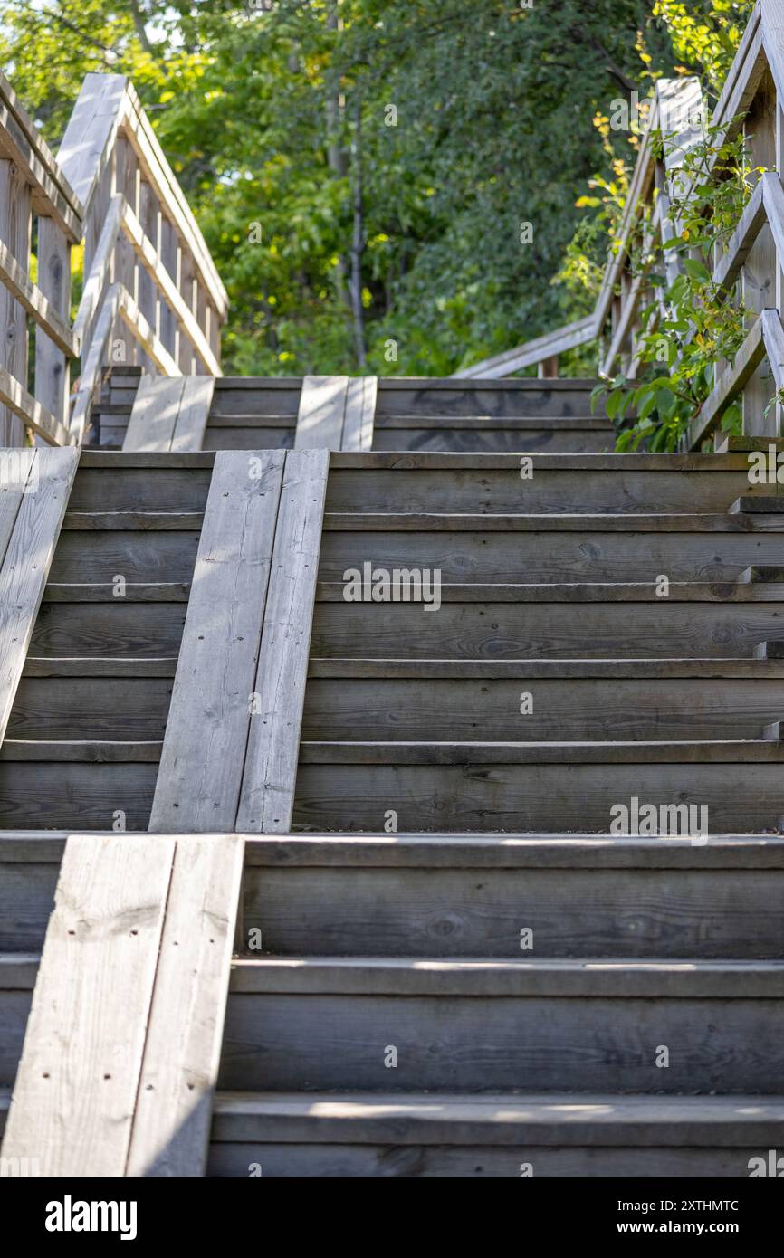 A set of stairs with accessibility aids for disabled people and prams ...
