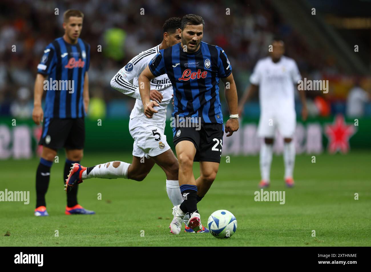 Jude Bellingham of Real Madrid and Sead Kolasinac of Atalanta during ...