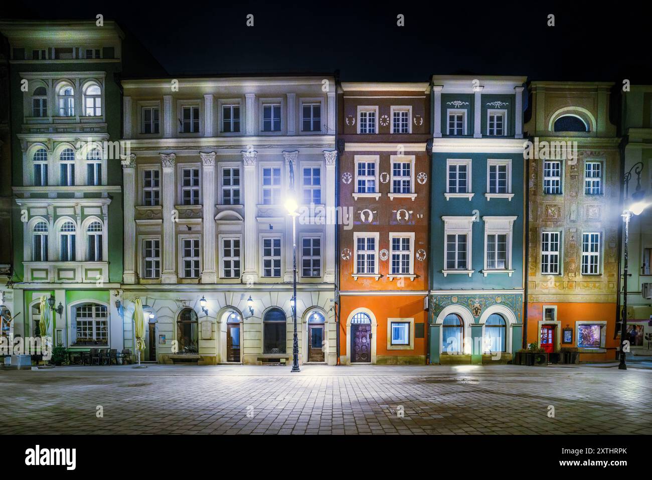 old market square in the center of a european city at night. Bright ...