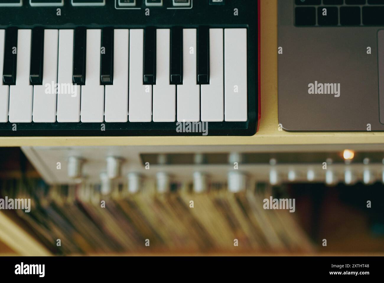 Vintage retro sound equipment. Piano keyboard amplifier and vinyl ...