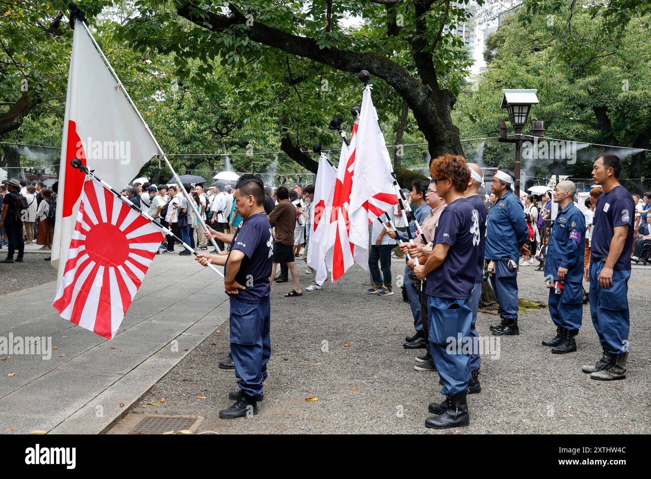Tokyo, Japan. 15th Aug, 2024. Japanese nationalists hold war flags of ...