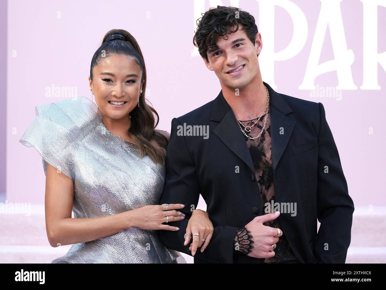 Ashley Park, left, and Paul Forman arrive at the premiere of "Emily in ...
