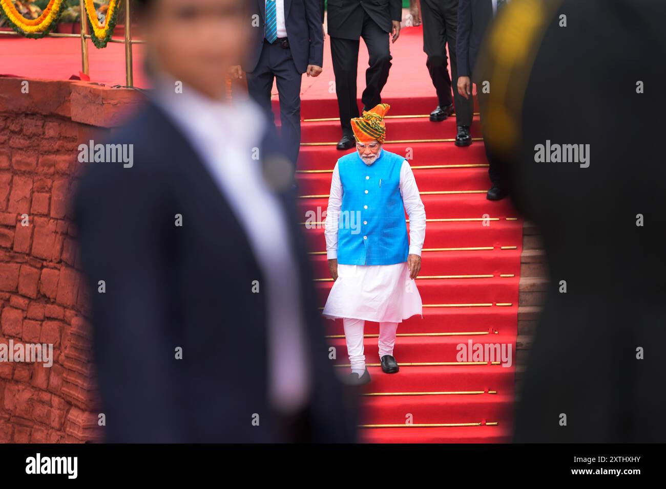 Indian Prime Minister Narendra Modi, center, returns after addressing ...