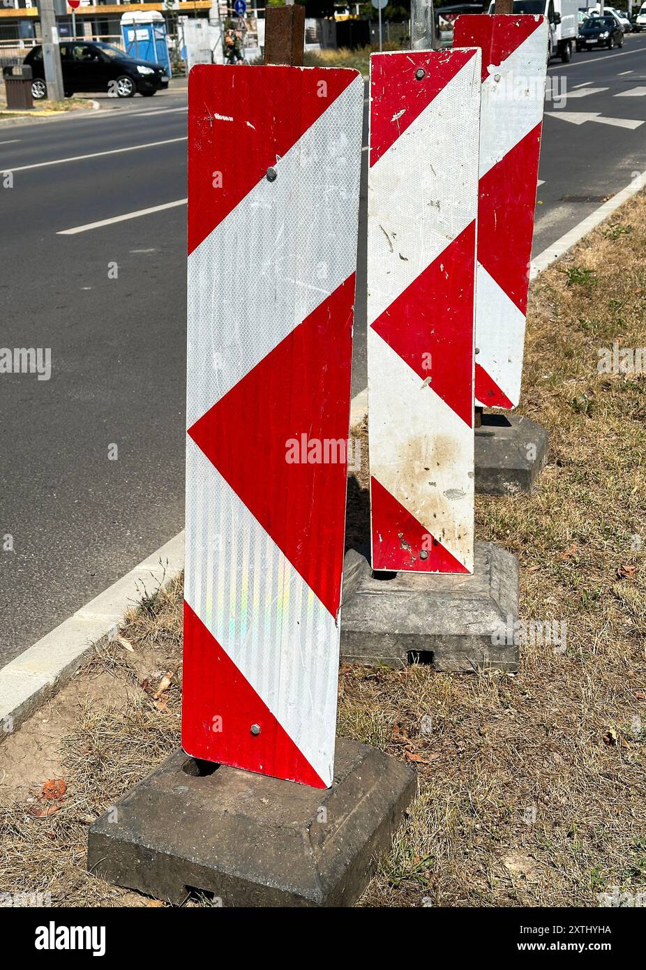 Road barrier signs on the street in the city Stock Photo - Alamy