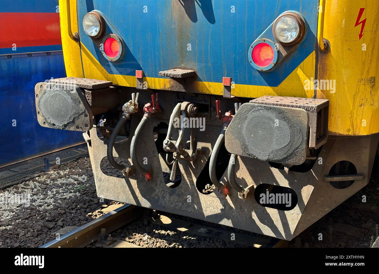 Bumpers and head lights of a train engine Stock Photo - Alamy