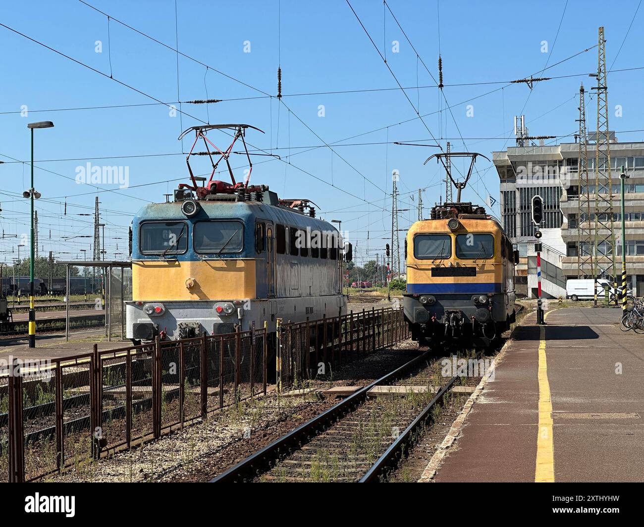 Two electric train engine at the platform Stock Photo - Alamy