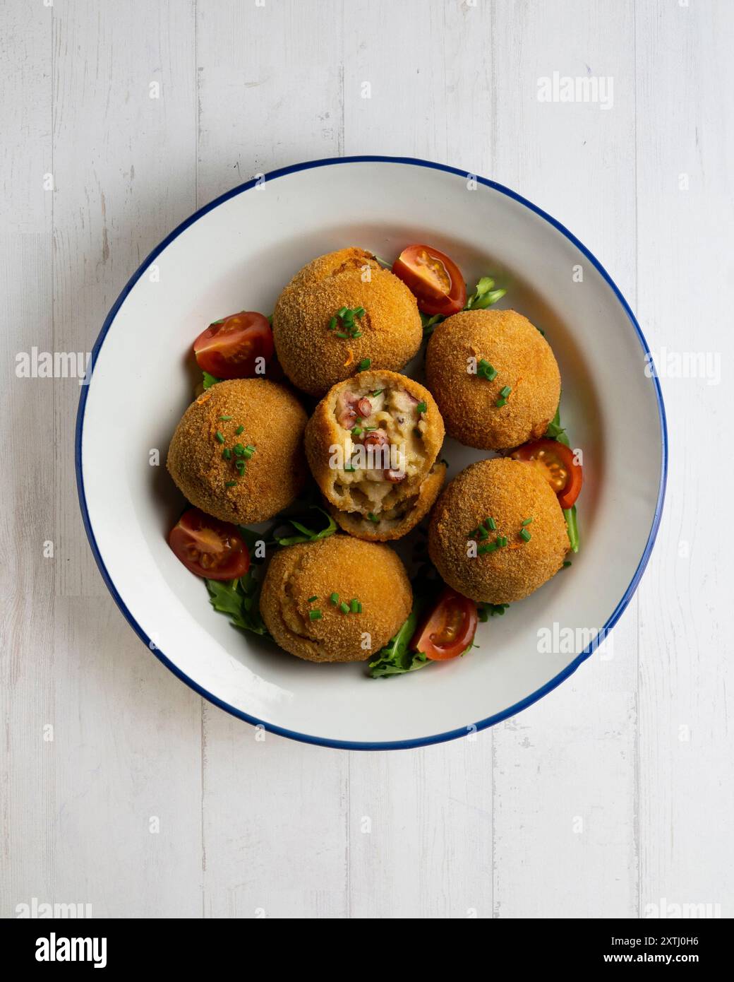Spanish Tapa croquettes made with bechamel sauce and stuffed with ...