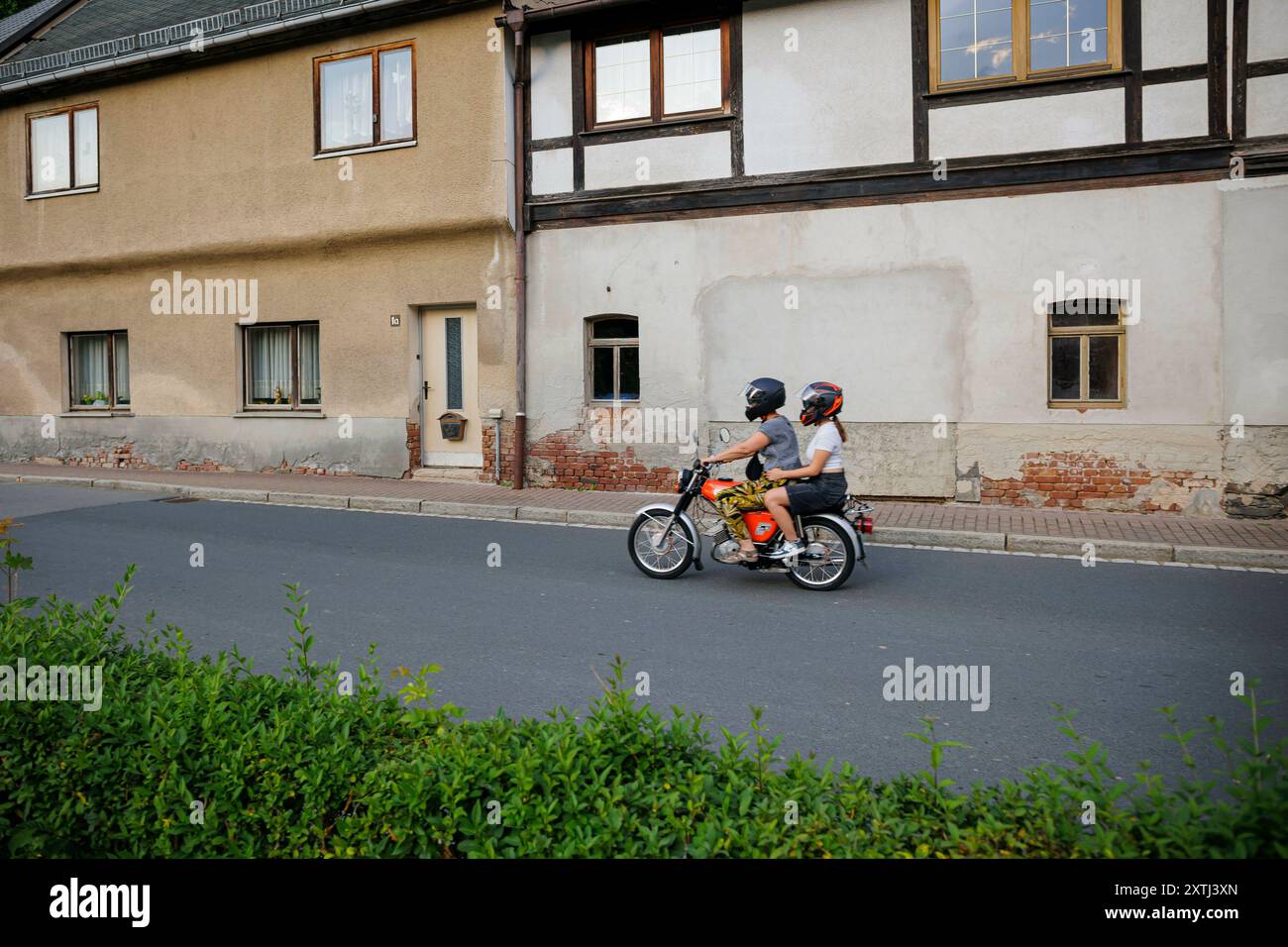 Boy girl on moped hi-res stock photography and images - Alamy