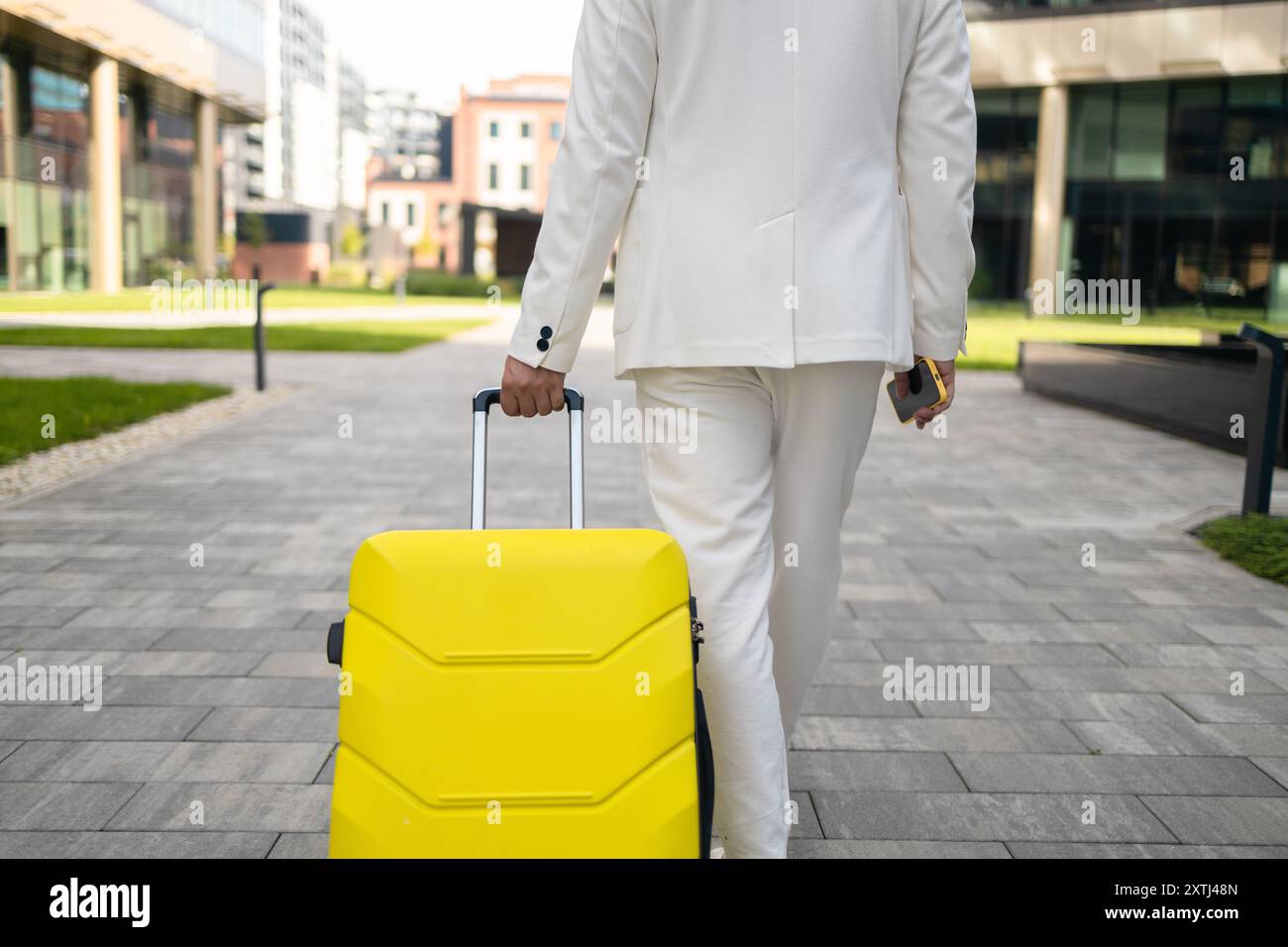 Guest arriving checking in man luggage hi-res stock photography and ...