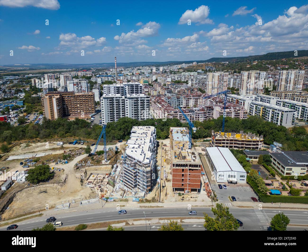 Aerial view of a cityscape with ongoing construction projects and ...