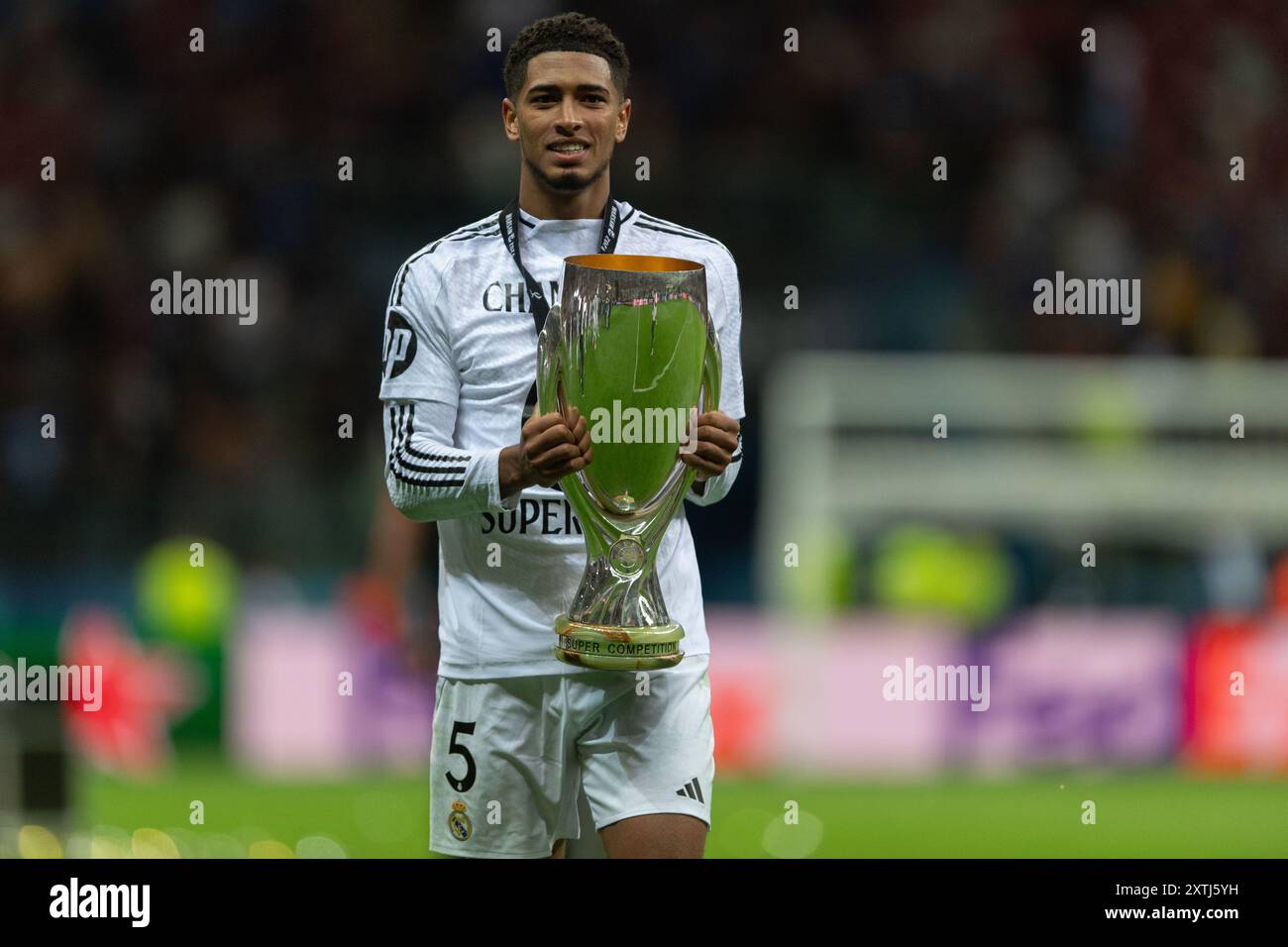 Jude Bellingham is celebrating and raising the cup after the victory of ...