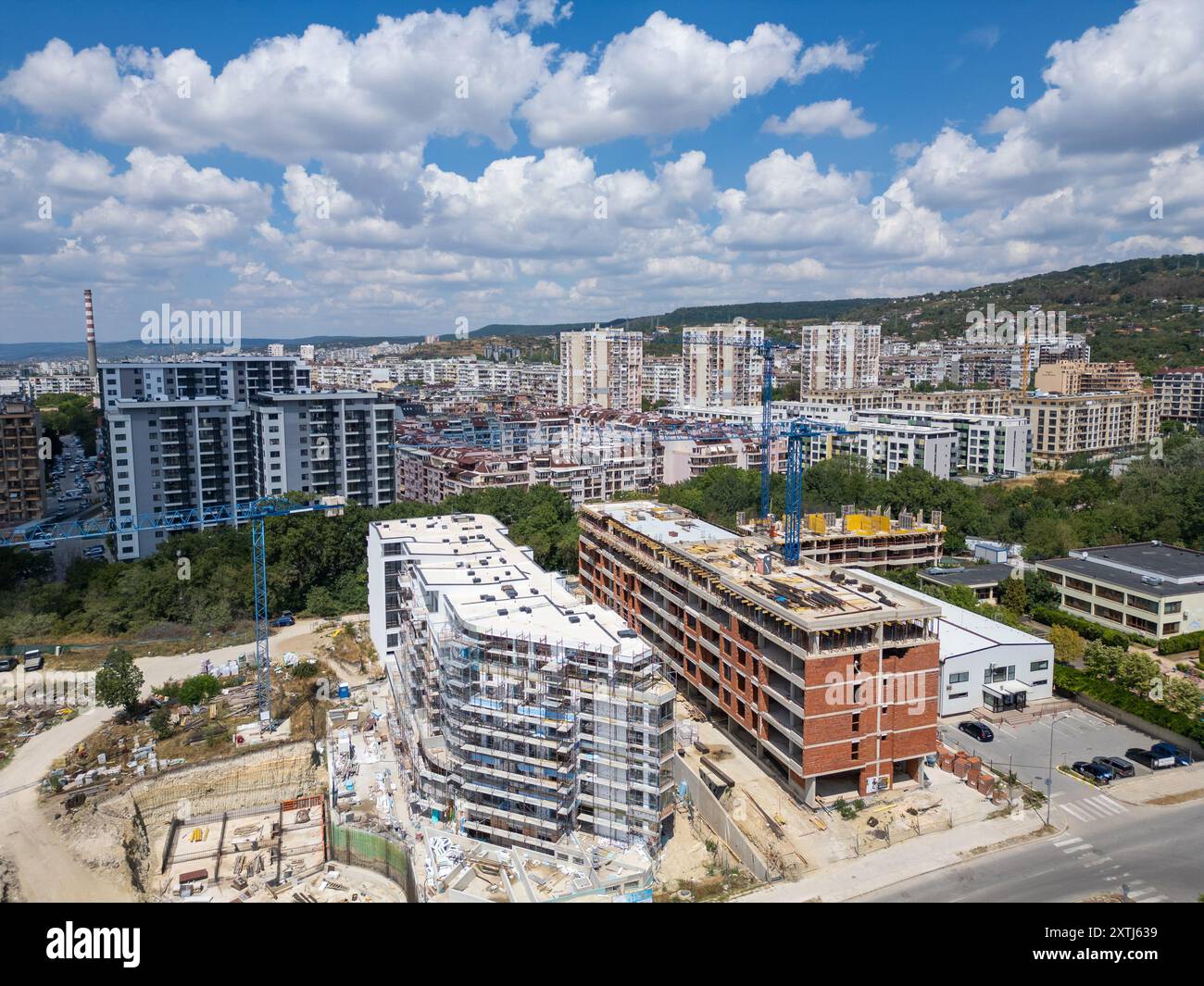 Aerial view of a cityscape with ongoing construction projects and ...