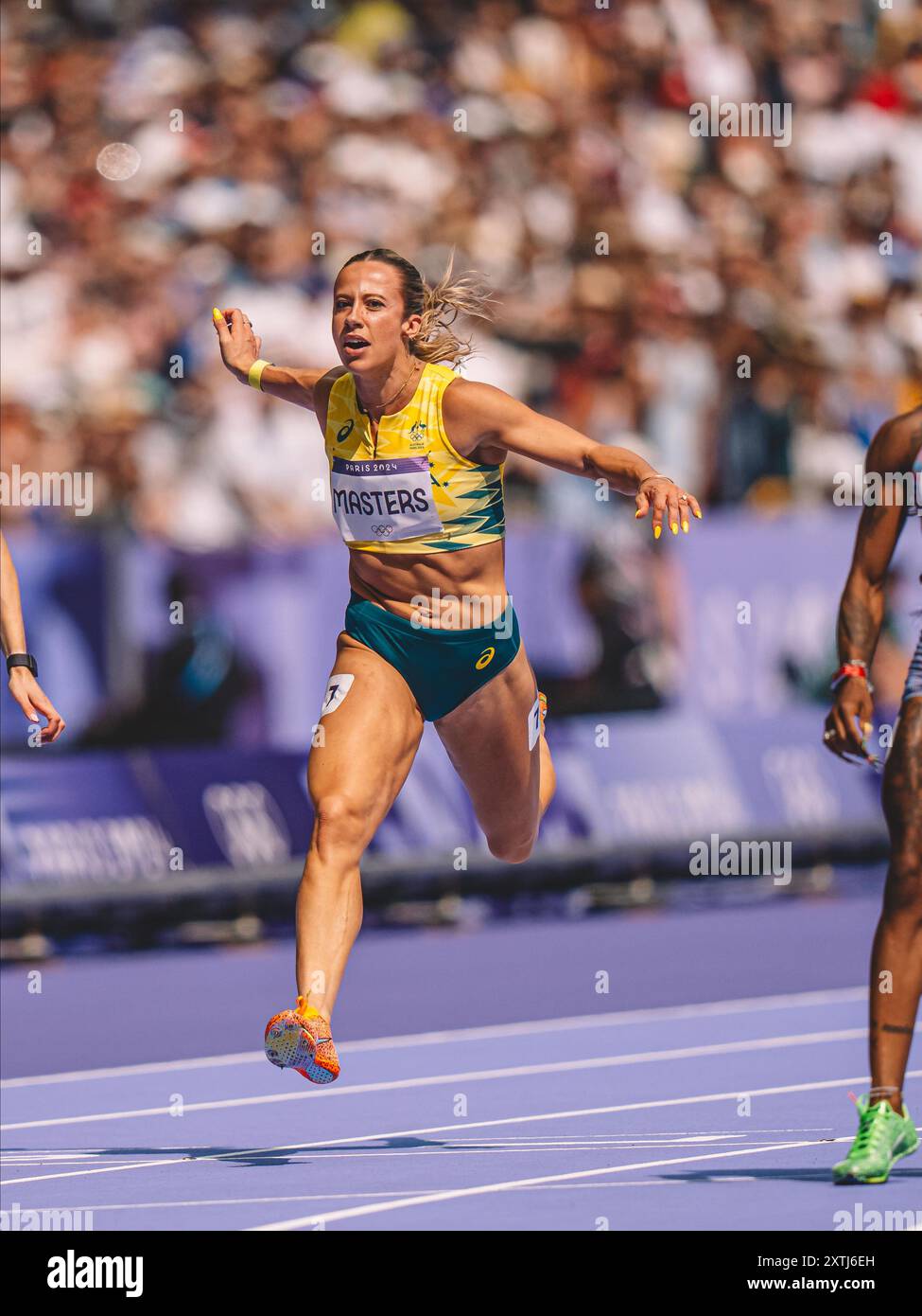 Bree Masters participating in the 100 meters at the Paris 2024 Olympic ...