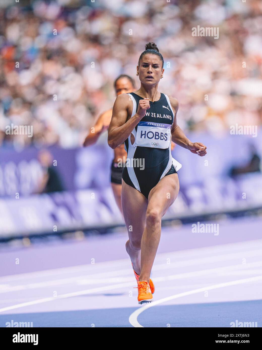 Zoe Hobbs participating in the 100 meters at the Paris 2024 Olympic ...