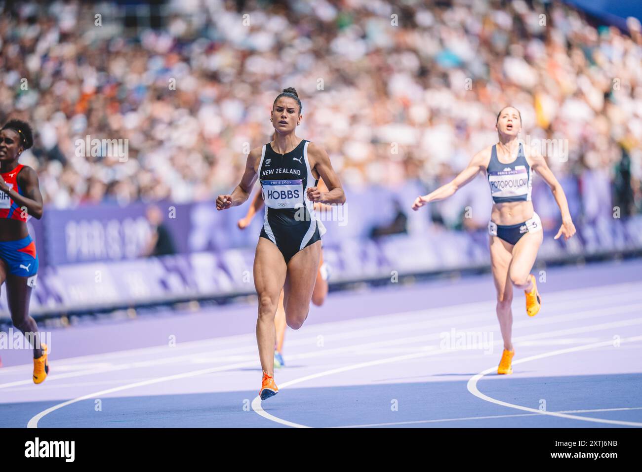 Zoe Hobbs participating in the 100 meters at the Paris 2024 Olympic ...