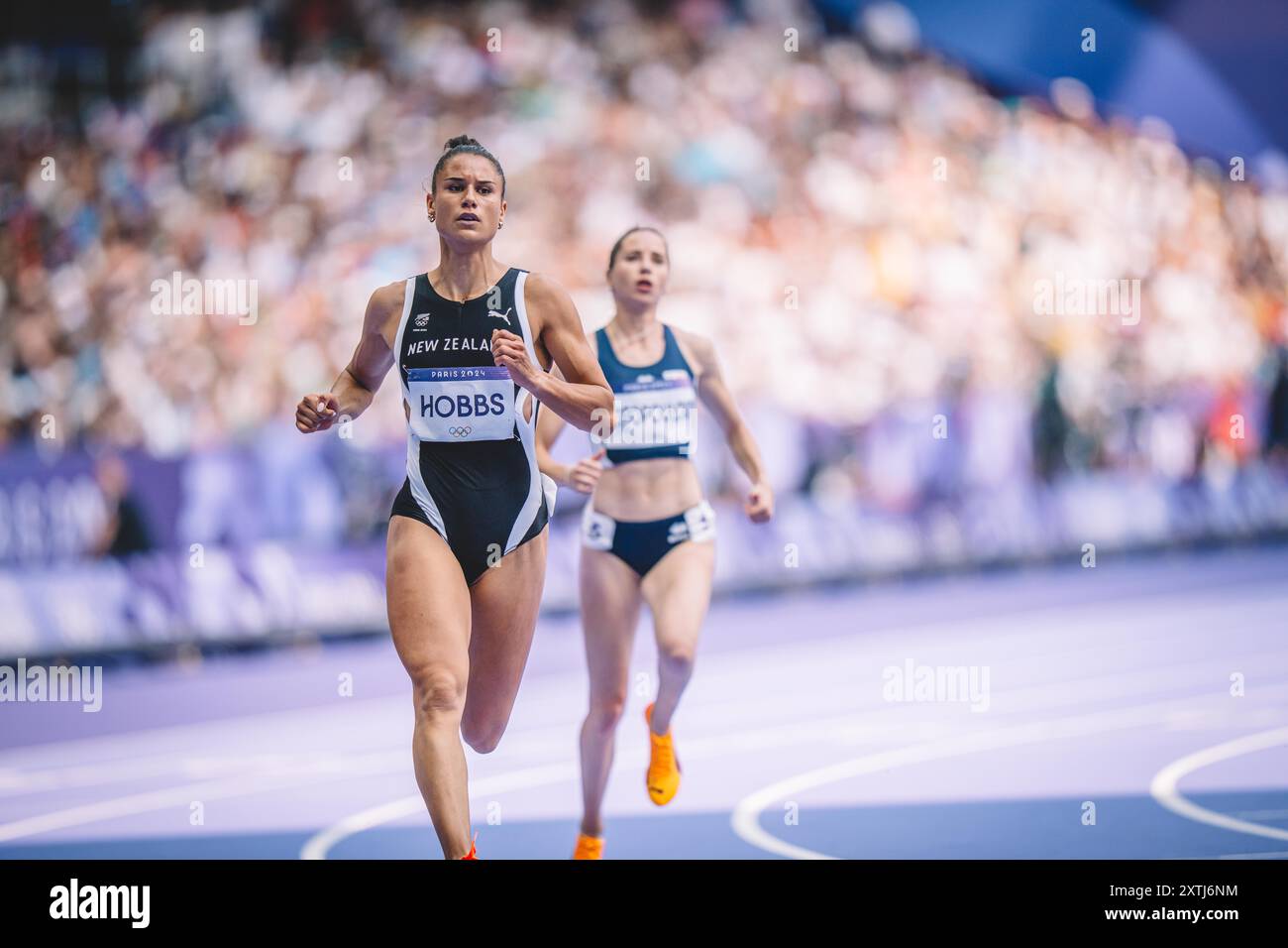 Zoe Hobbs participating in the 100 meters at the Paris 2024 Olympic ...