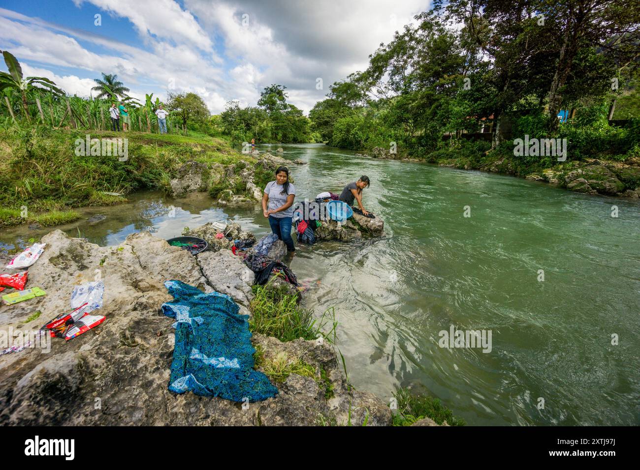 Washing clothes in the Cuatro Chorros river, Lancetillo, La Parroquia ...