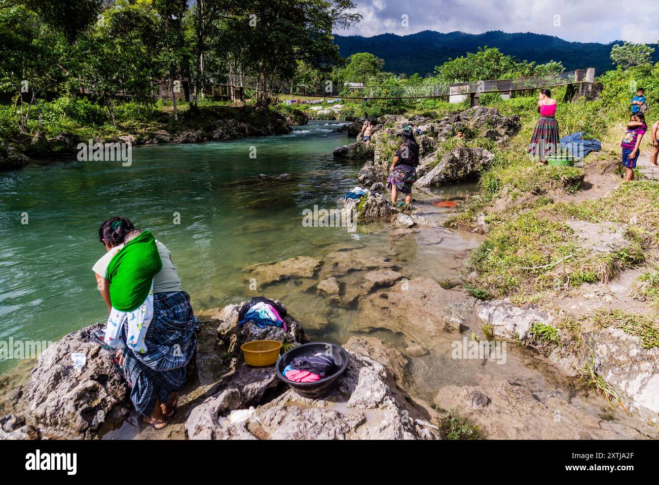 Washing clothes in the Cuatro Chorros river, Lancetillo, La Parroquia ...