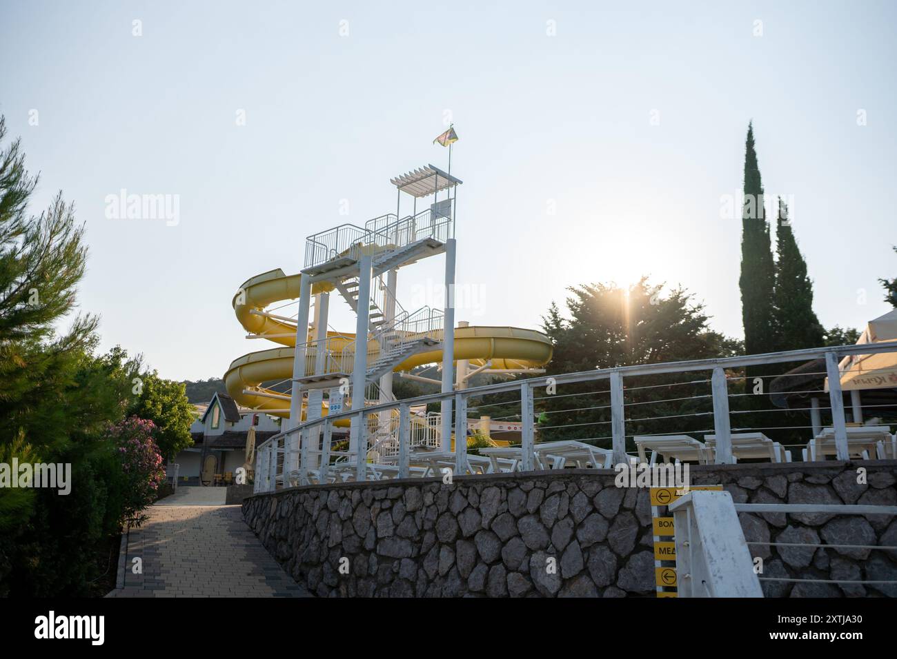 Waterpark Slide Tower Summer - A yellow water slide with a tower, a ...