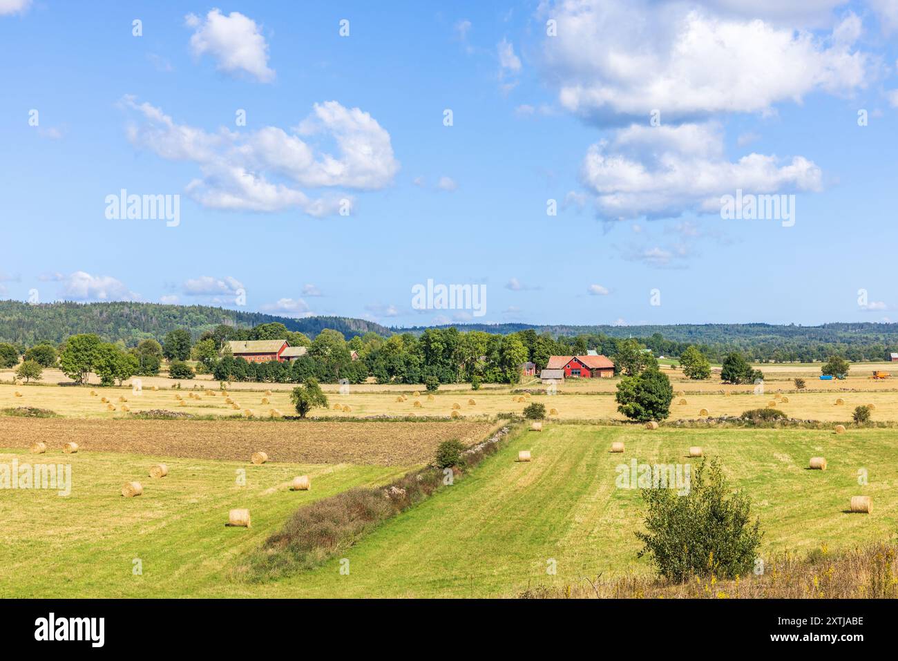 Farm and fields in a rural landscape view Stock Photo - Alamy