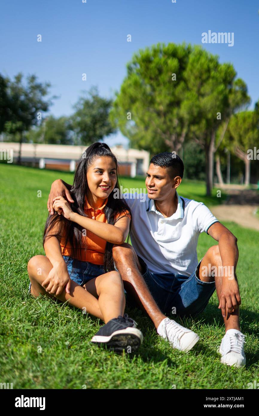 Young latin couple embrace hi-res stock photography and images - Alamy