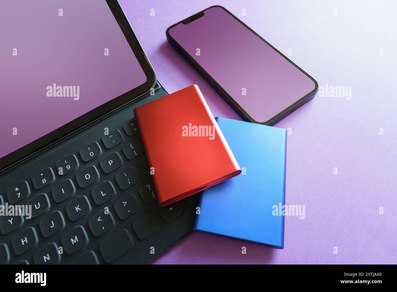 Laptop computer and elecronic devices. Mobile storage ssd drive. Blank ...