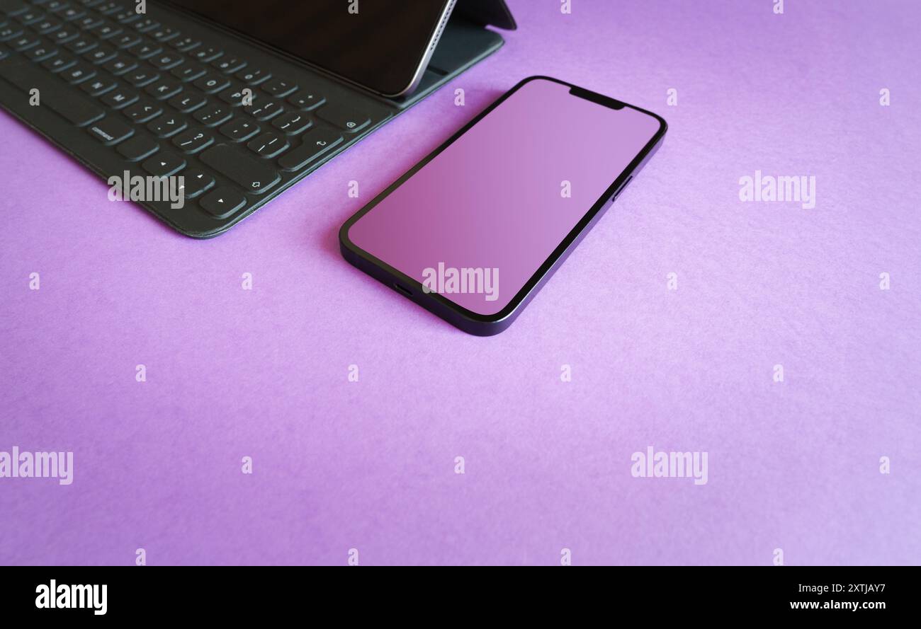 Smart phone clean screen mockup. Purple background Stock Photo - Alamy