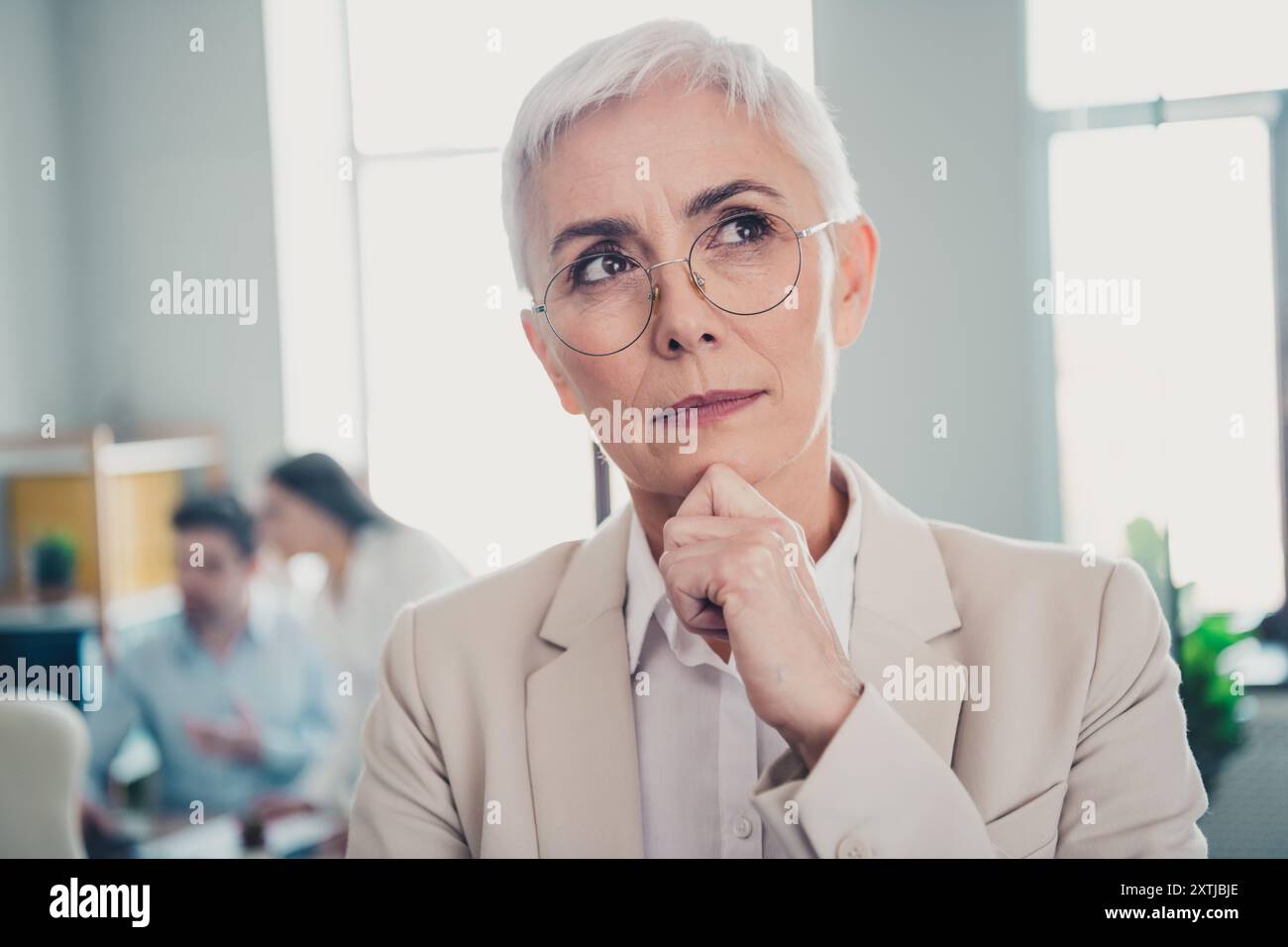 Photo of thoughtful boss business lady touch chin look thinking in ...