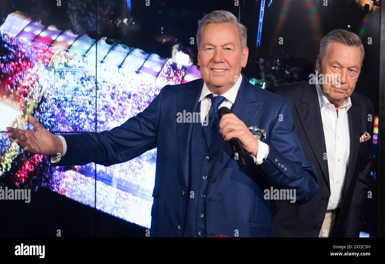 15 August 2024, Berlin: Pop star Roland Kaiser (r) appears behind his ...