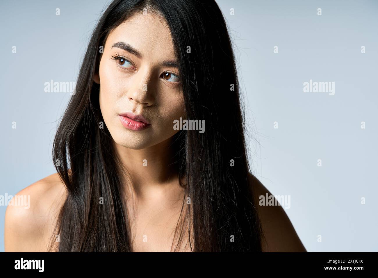 Beautiful young black female stares hi-res stock photography and images ...