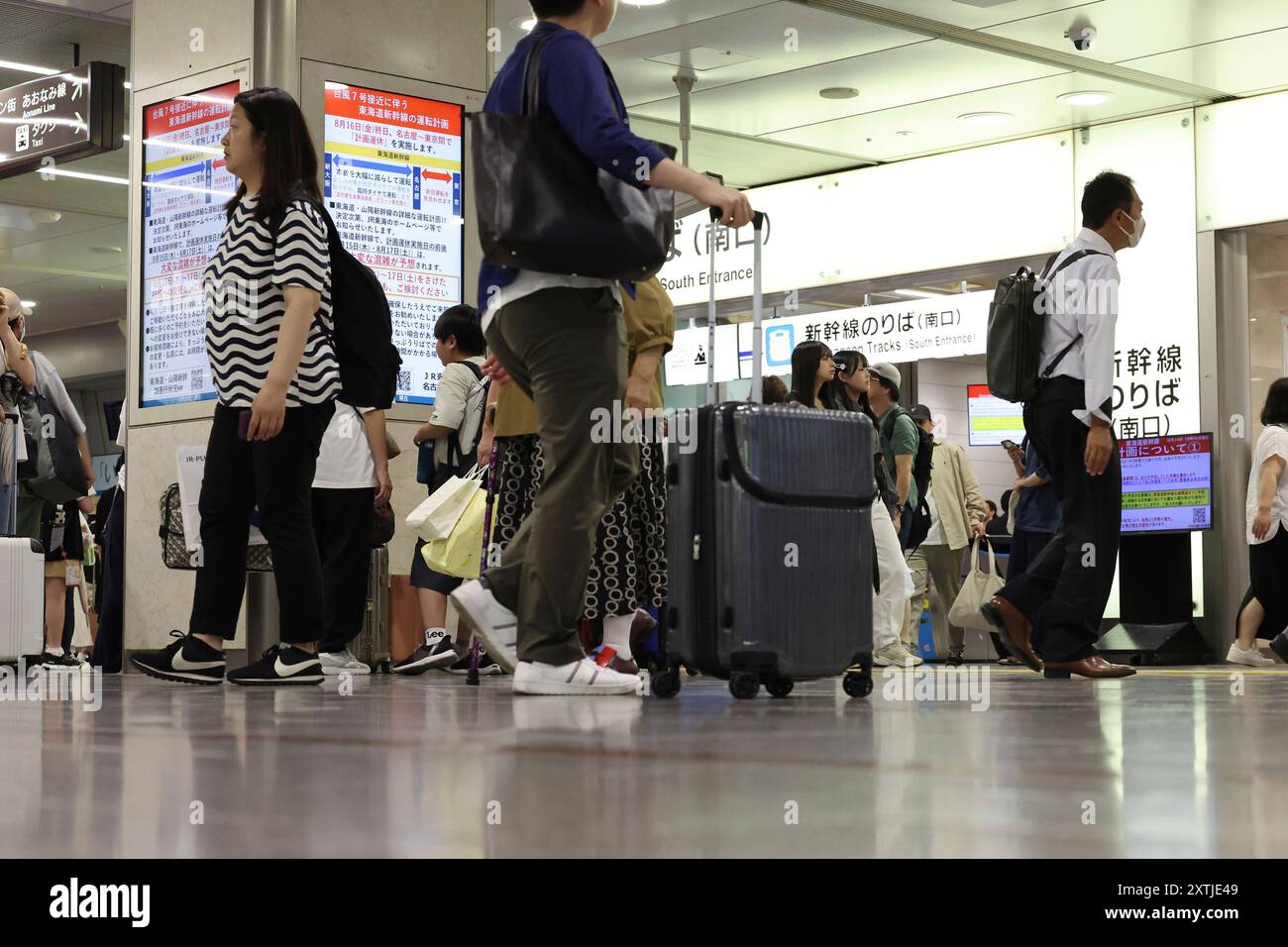 An electronic signboard inside the station announces the planned ...