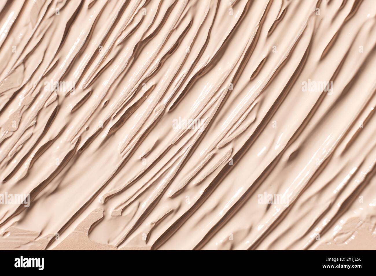 Face foundation texture, beautiful unusual beige abstract background ...