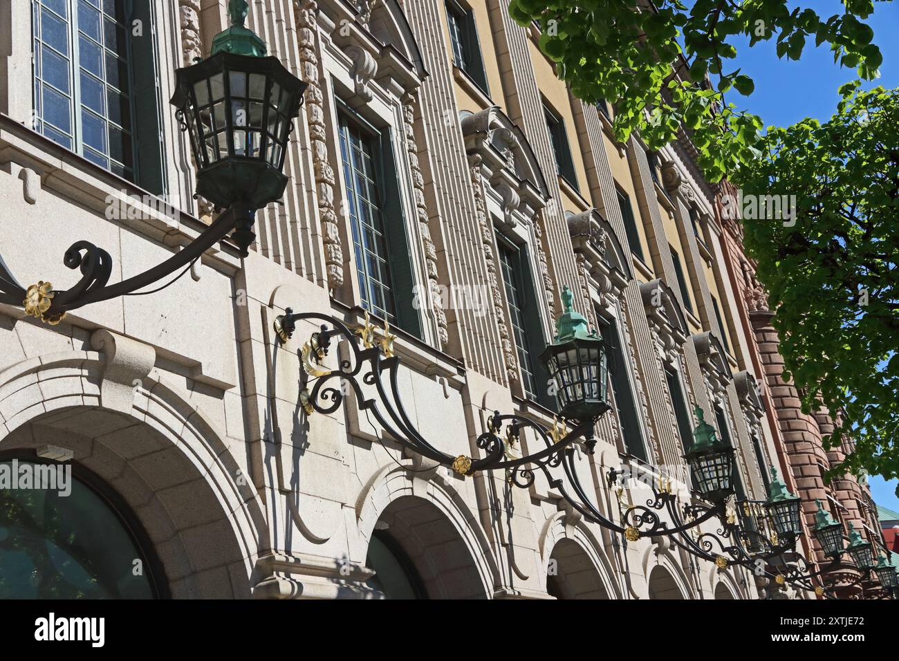 Ornate street lights on front of building, Stockholm Stock Photo - Alamy