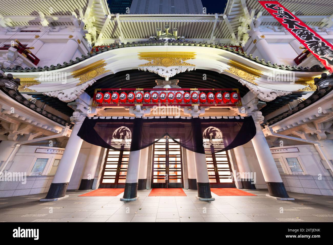 TOKYO, JAPAN - JULY 8, 2024: The Kabukiza Theatre illuminated at night ...