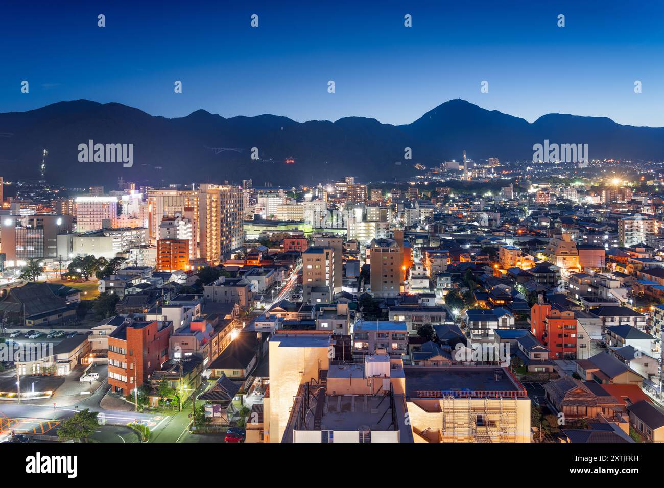 Beppu, Oita, Japan city skyline with the mountains at blue hour Stock ...